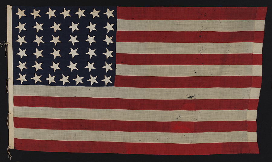 38 CANTED HAND-SEWN STARS AND HAND-SEWN STRIPES ON A FLAG IN A ...