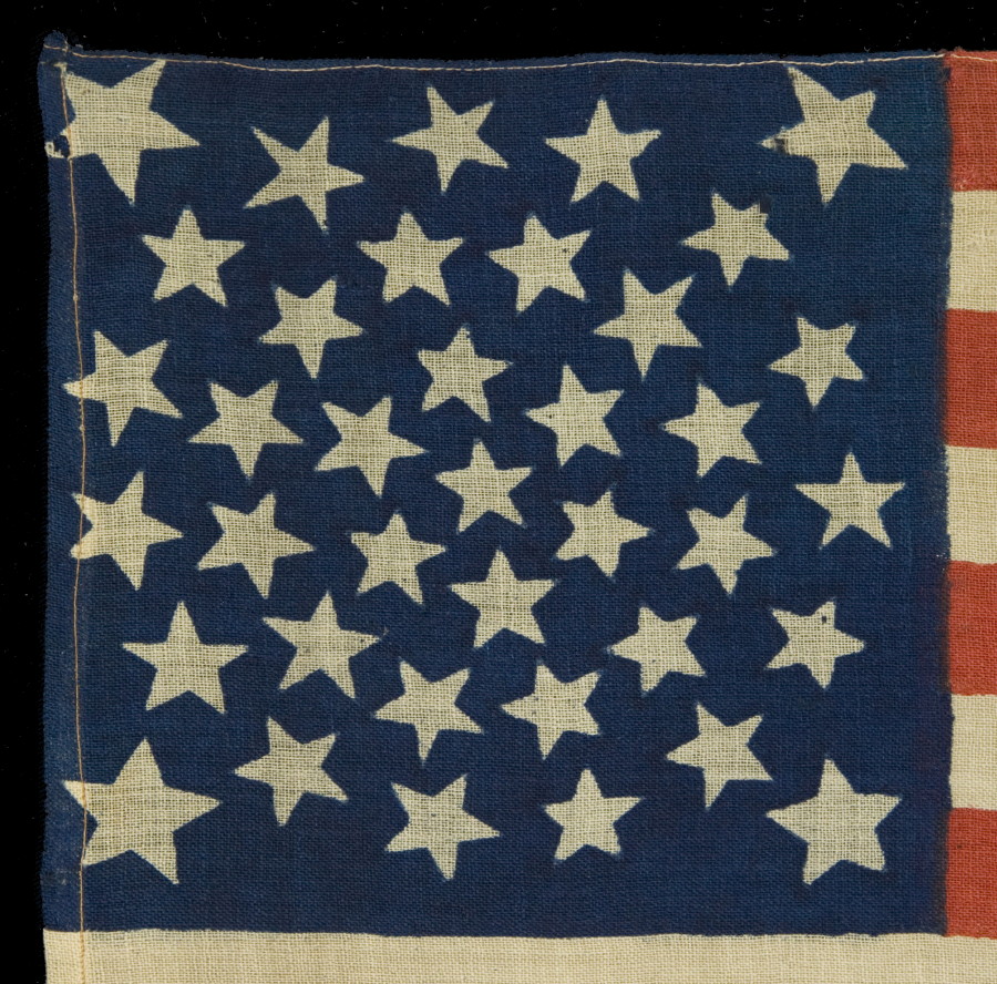 38 STARS, COLORADO STATEHOOD, A VERY RARE MEDALLION PATTERN FLAG WITH 4 ...