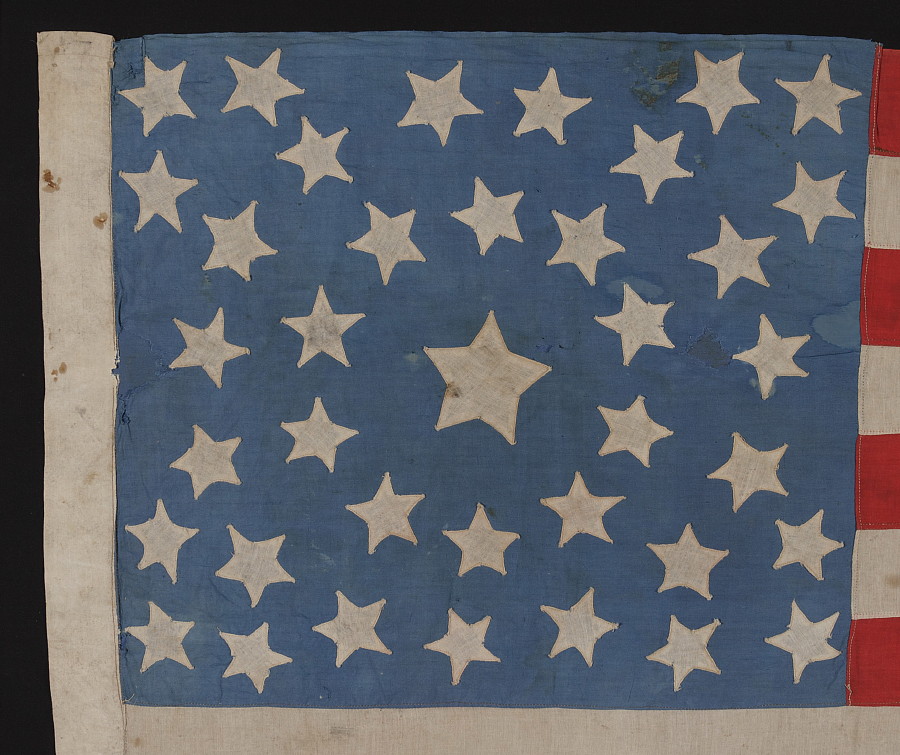 38 STARS ON A CORNFLOWER BLUE CANTON, IN A MEDALLION CONFIGURATION ...