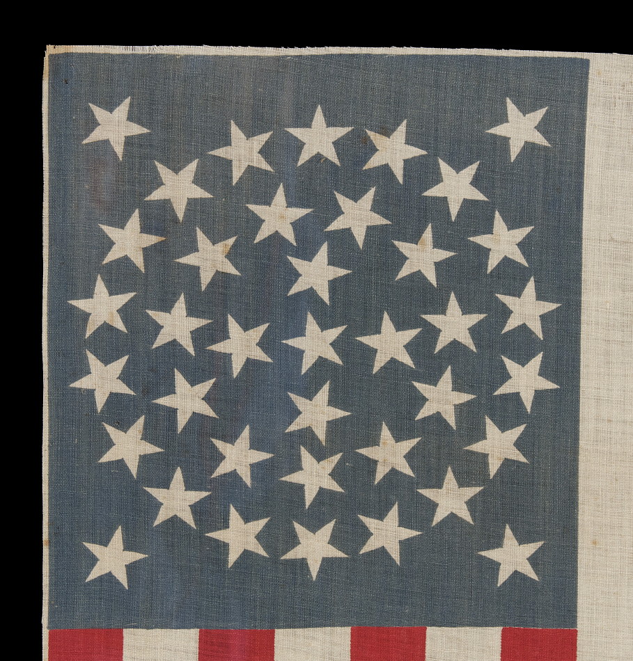 38 STARS IN A DOUBLE WREATH PATTERN WITH A CROSS OF STARS IN THE CENTER ...