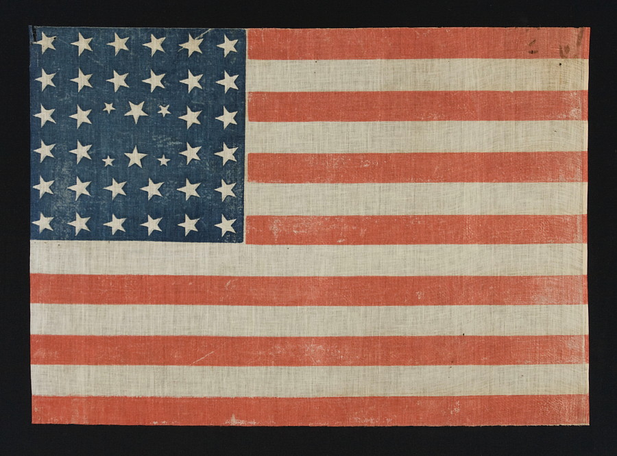 38 STARS IN AN EXTREMELY RARE LINEAL CONFIGURATION THAT HAS 4 TINY ...