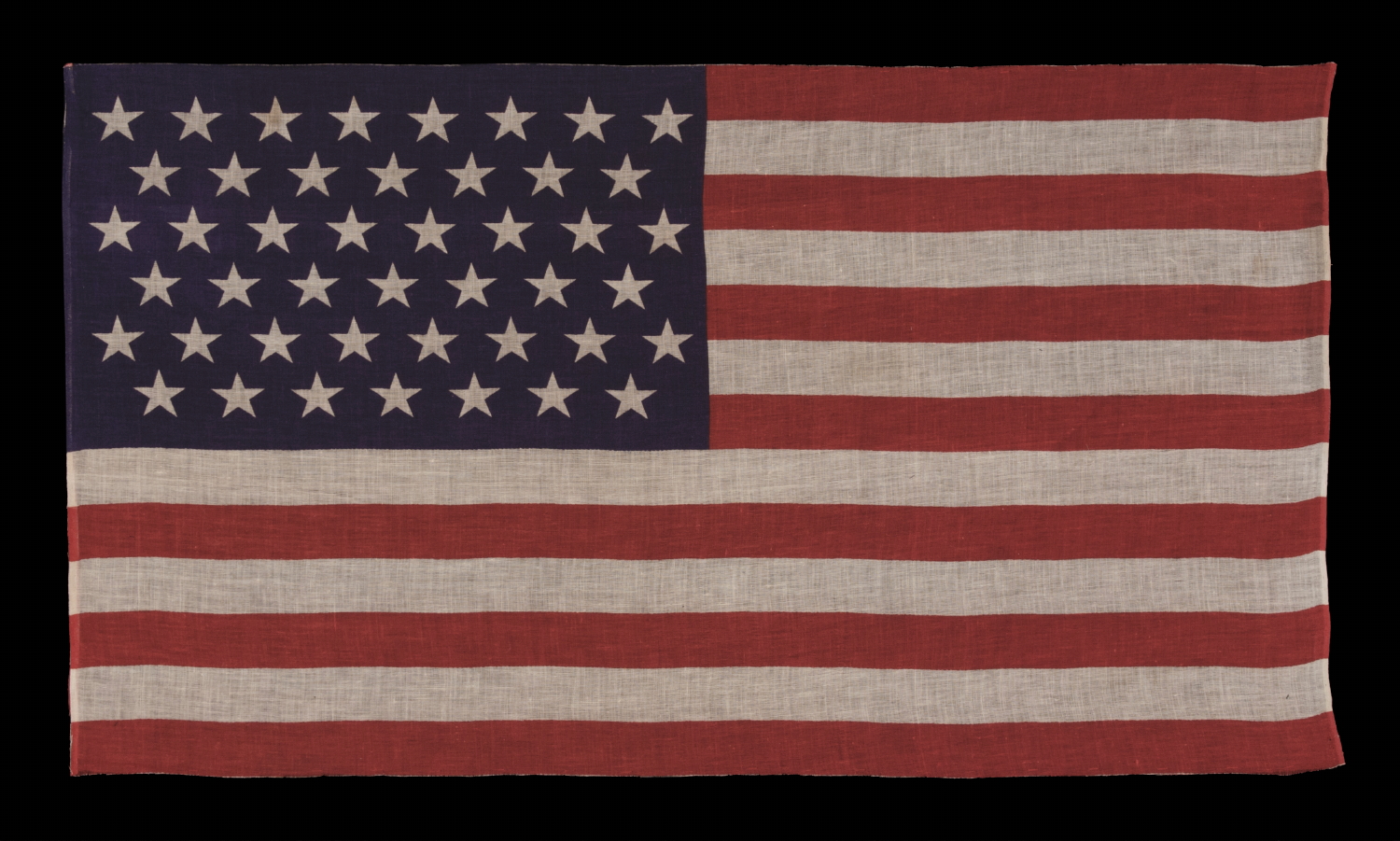 45 STARS IN STAGGERED ROWS ON AN ANTIQUE AMERICAN PARADE FLAG OF THE ...