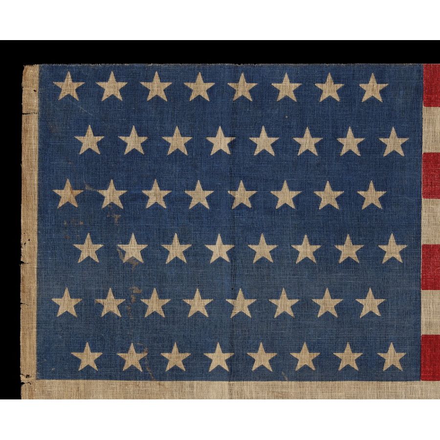 48 STARS IN STAGGERED ROWS ON A PARADE FLAG WITH A BRILLIANT ...