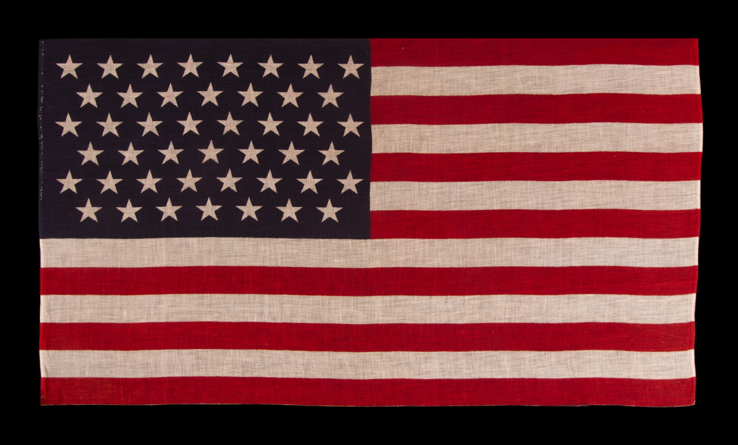 45 STARS IN STAGGERED ROWS ON AN ANTIQUE AMERICAN PARADE FLAG OF THE ...